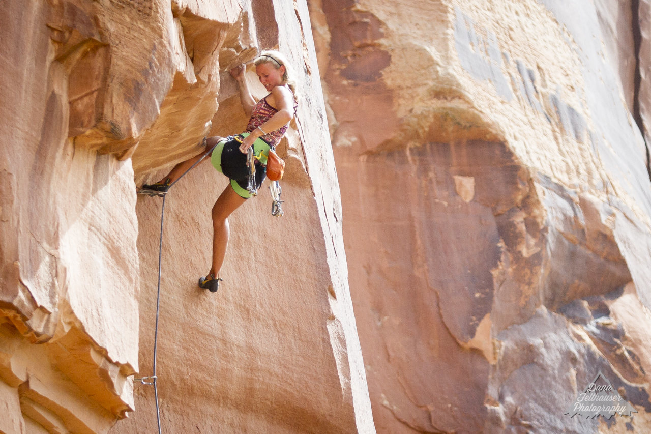 Brette Harrington reaches for a cam, attempting to onsight Ruby's Cafe.
