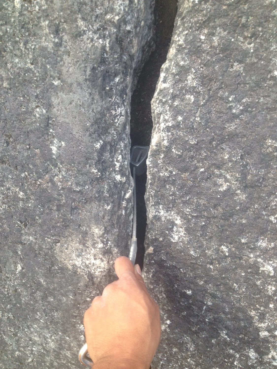 Next one down goes it but it keeps sliding down the crack ... The ...