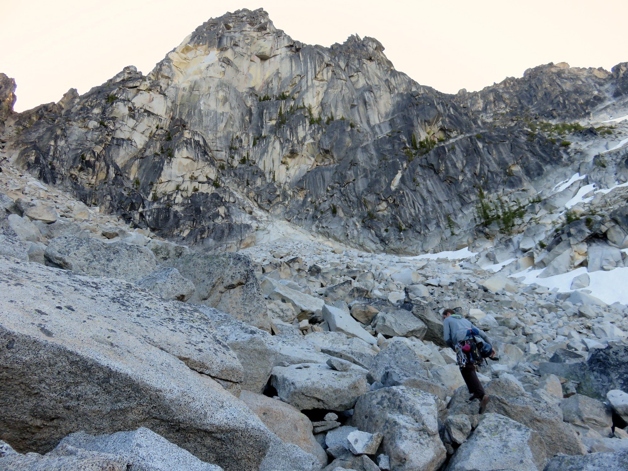Approaching the West Face of Colchuck Balanced Rock from the basin below.