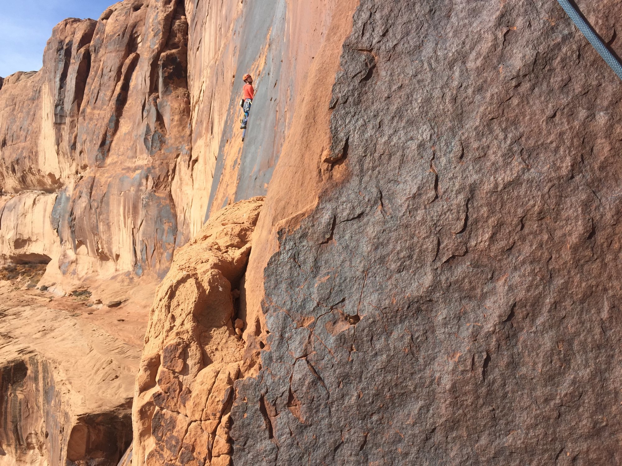 Looking left of the hanging belay. We noticed a piton down and left ...