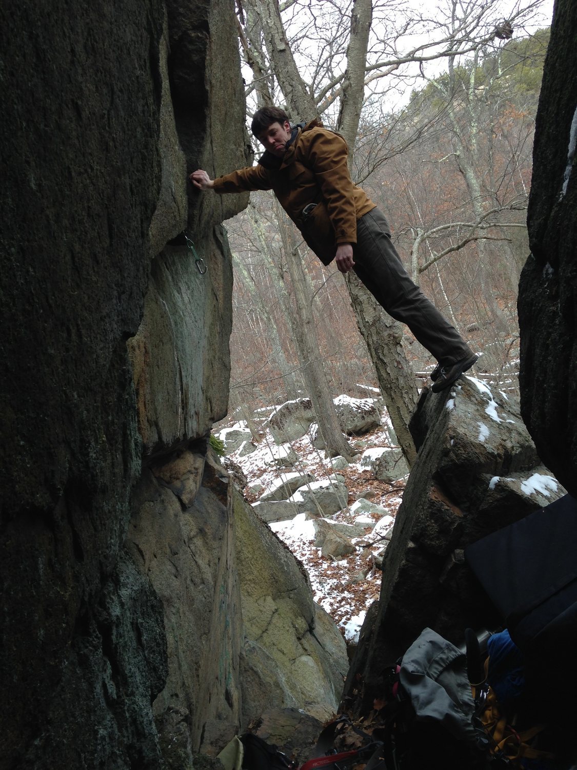 Checking out the gear placements in a sweet overhung hand crack. The ...