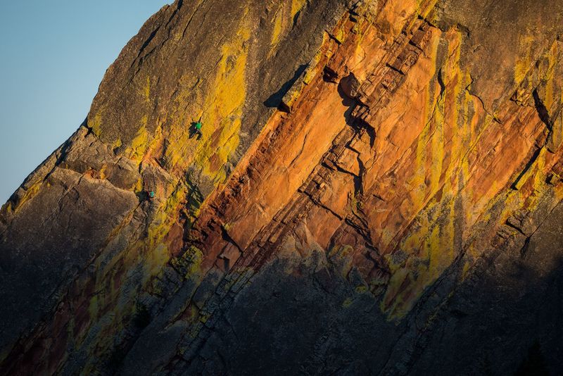Phil Gruber climbing through the Yellow Door. Photo courtesy of Carline ...