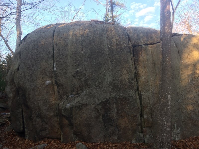 Climbing in Lunch Break Boulder, North Shore