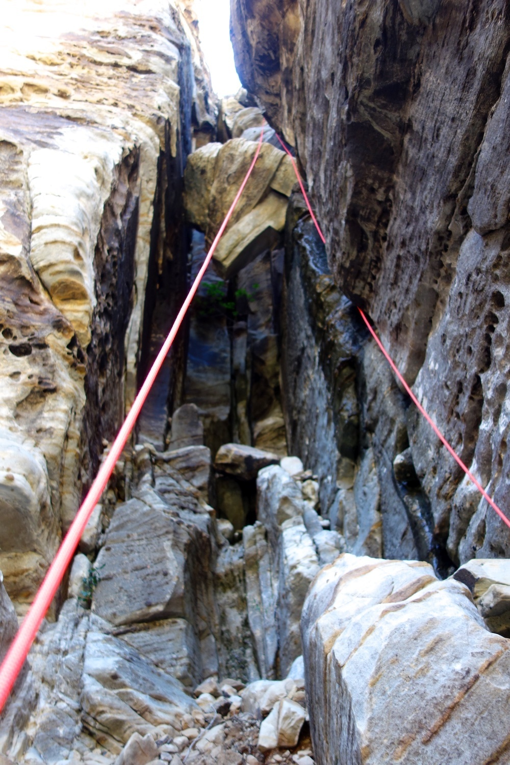 Rap at the base of the gully descent on the south side. There are 2 ...