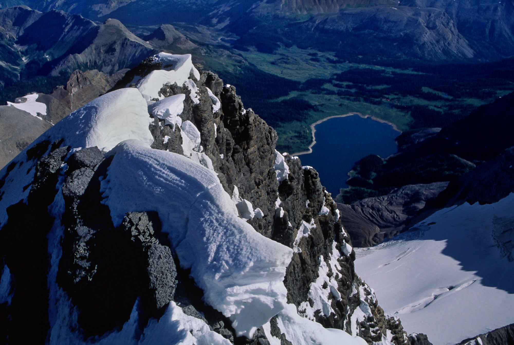 Walking the narrow summit ridge on the way back down - August 1998