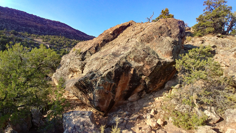 Climbing in Kiss Blower Boulder, Grand Junction Area