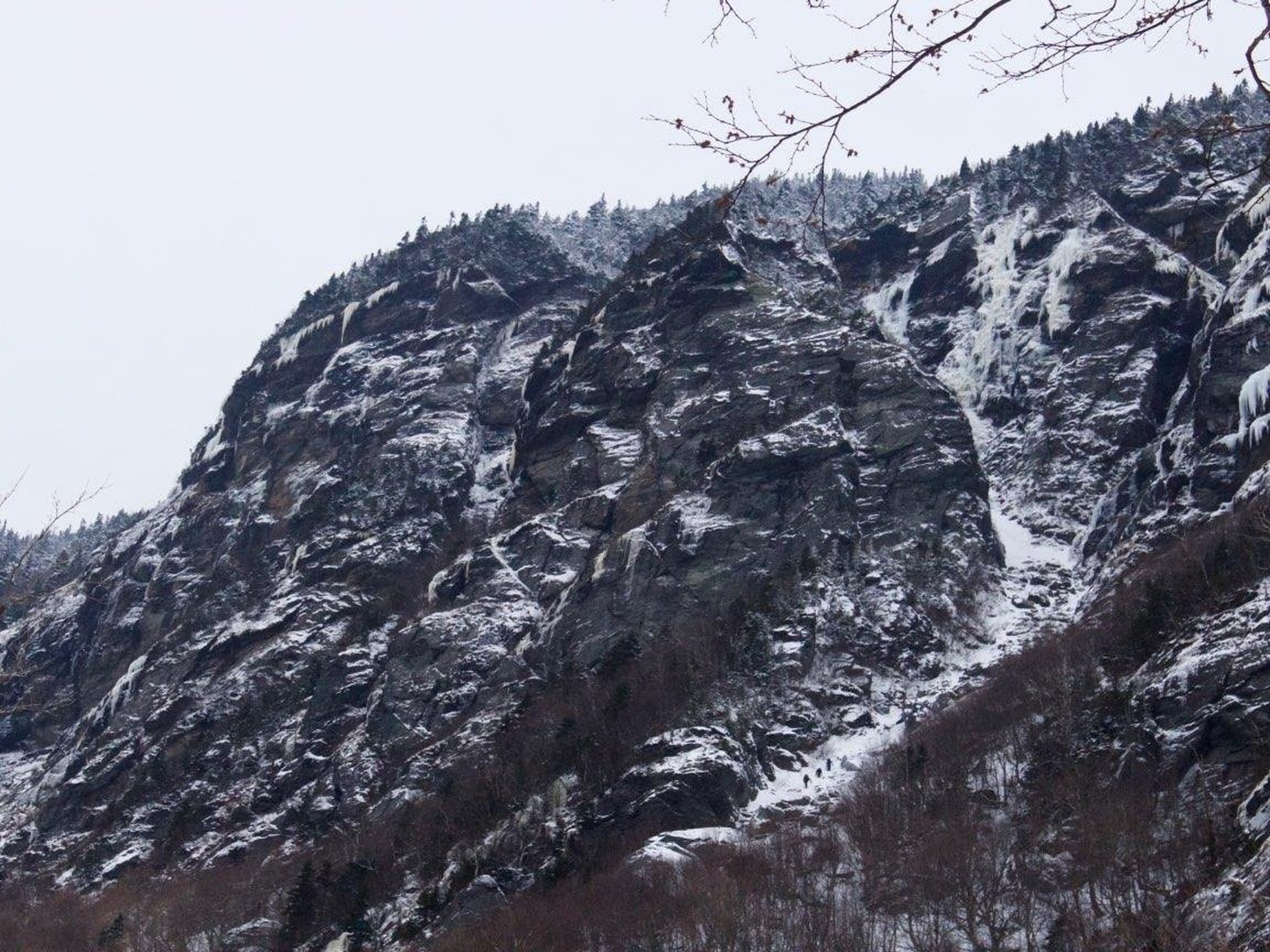 Easy gully area with climbers descending lower snow slope. Photo by ...