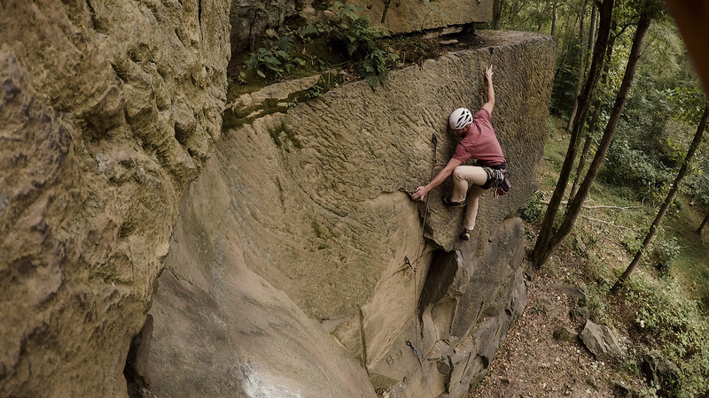 Start to the right of the first bolt, traverse left and foot jam up ...