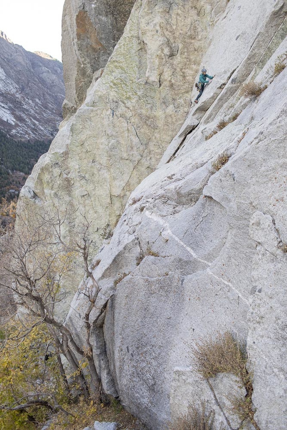 Sarah Geers negotiates the traverse to the anchors of the first pitch.