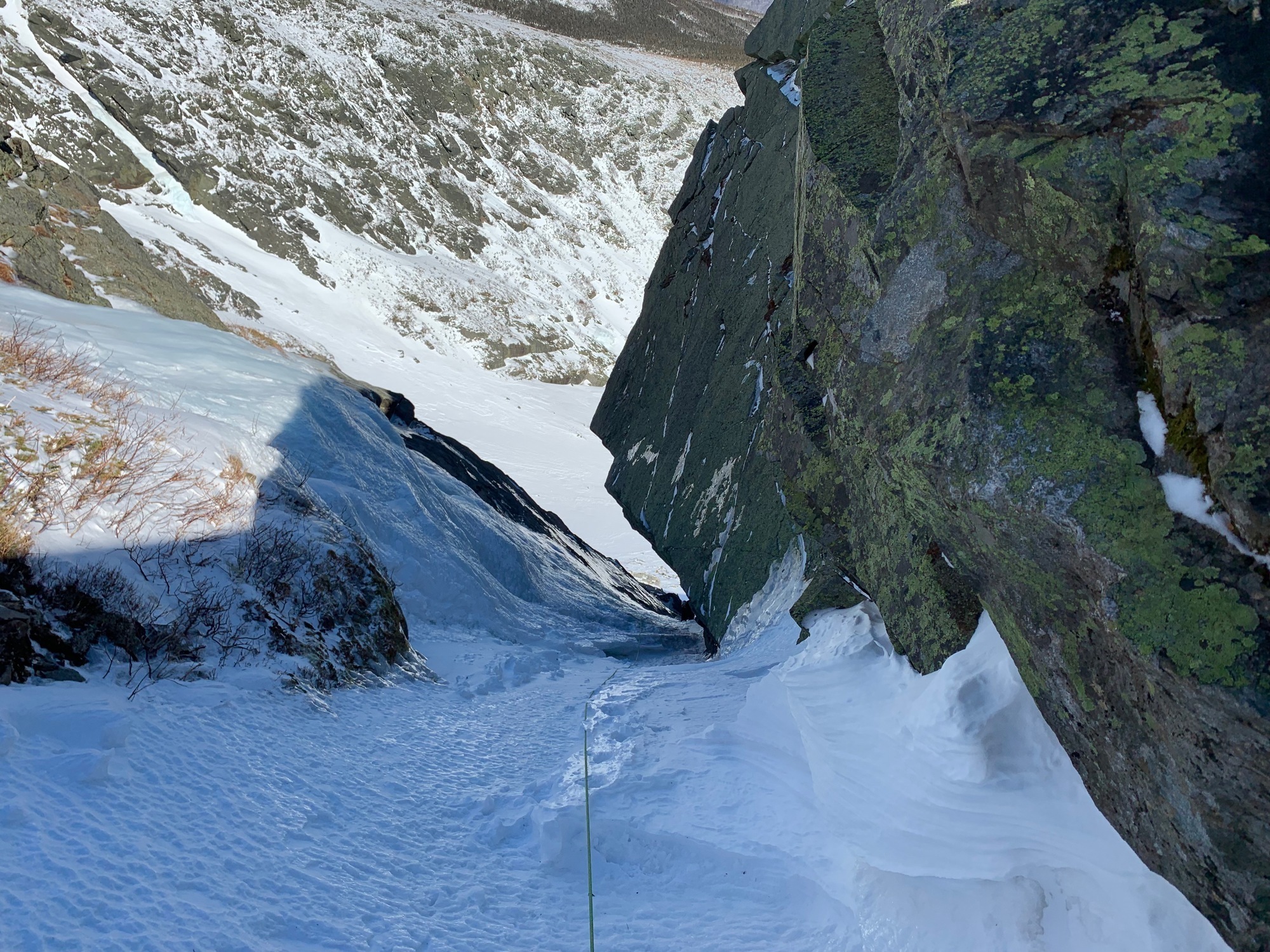 Parker (barely visible) belays me up the final pitch to the top of ...