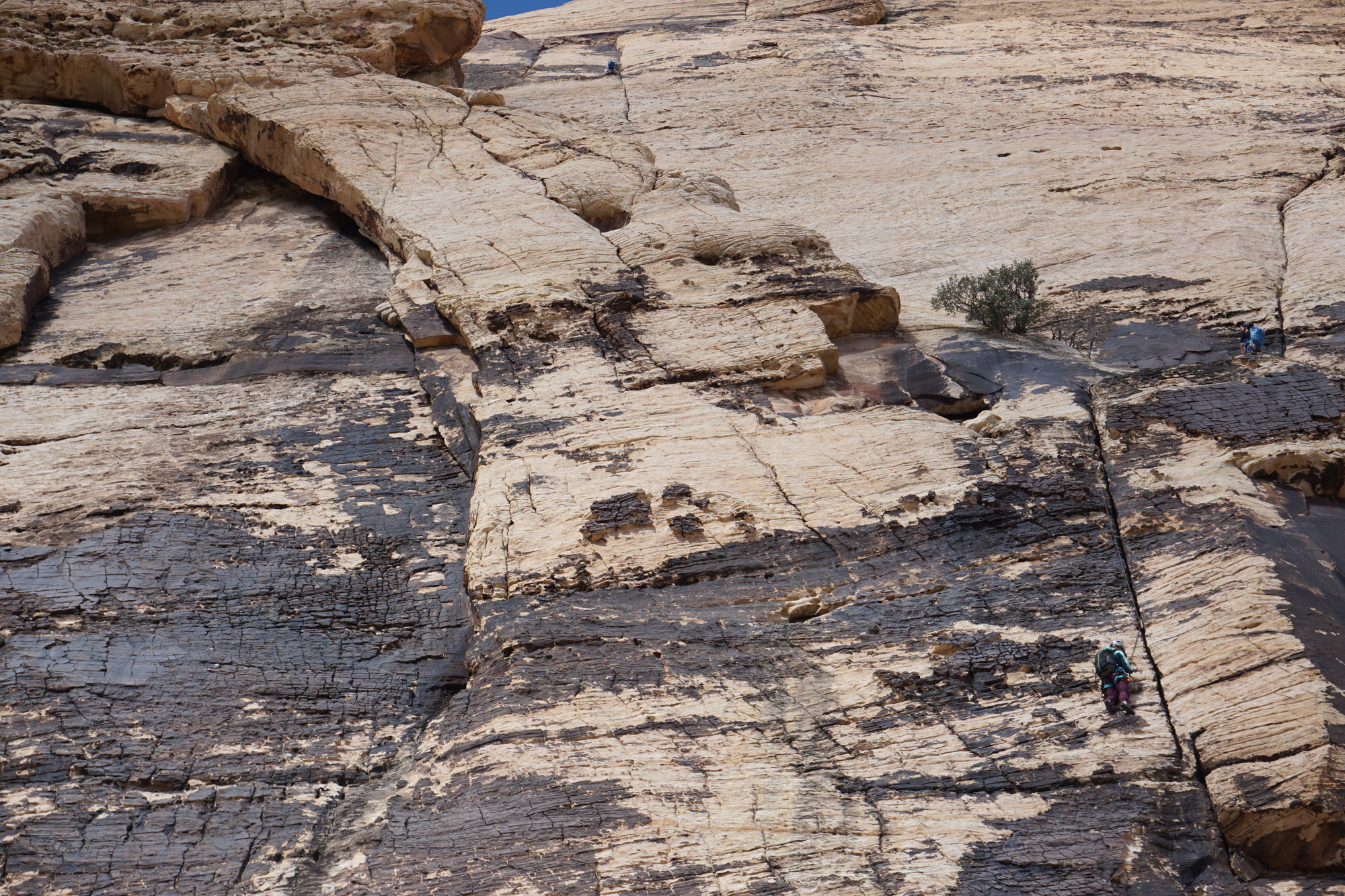 Three climbers on Solar Slab with one hidden up in the great pitch 3 ...
