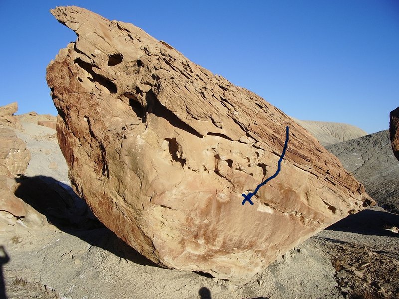 Pull up on good slopey ledge above head to start, dyno to the lip, then ...