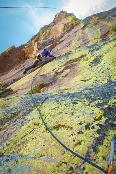 "Heather Weidner begins the second pitch. A fixed line hangs from the ...