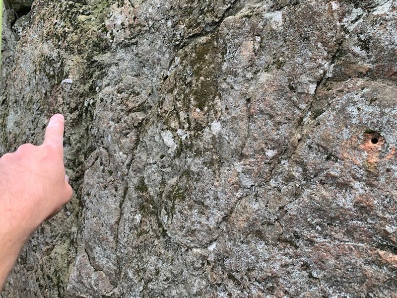 Use caution when climbing the route, the original bolt (hole) on the ...