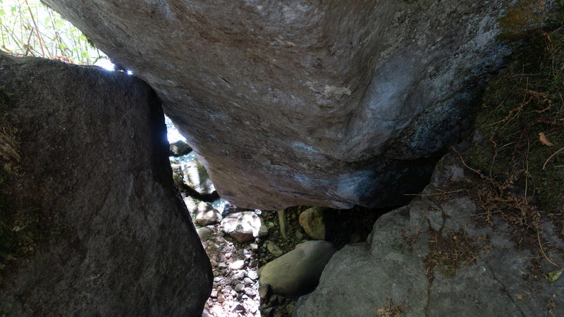 The top section of the boulder coming out the hole