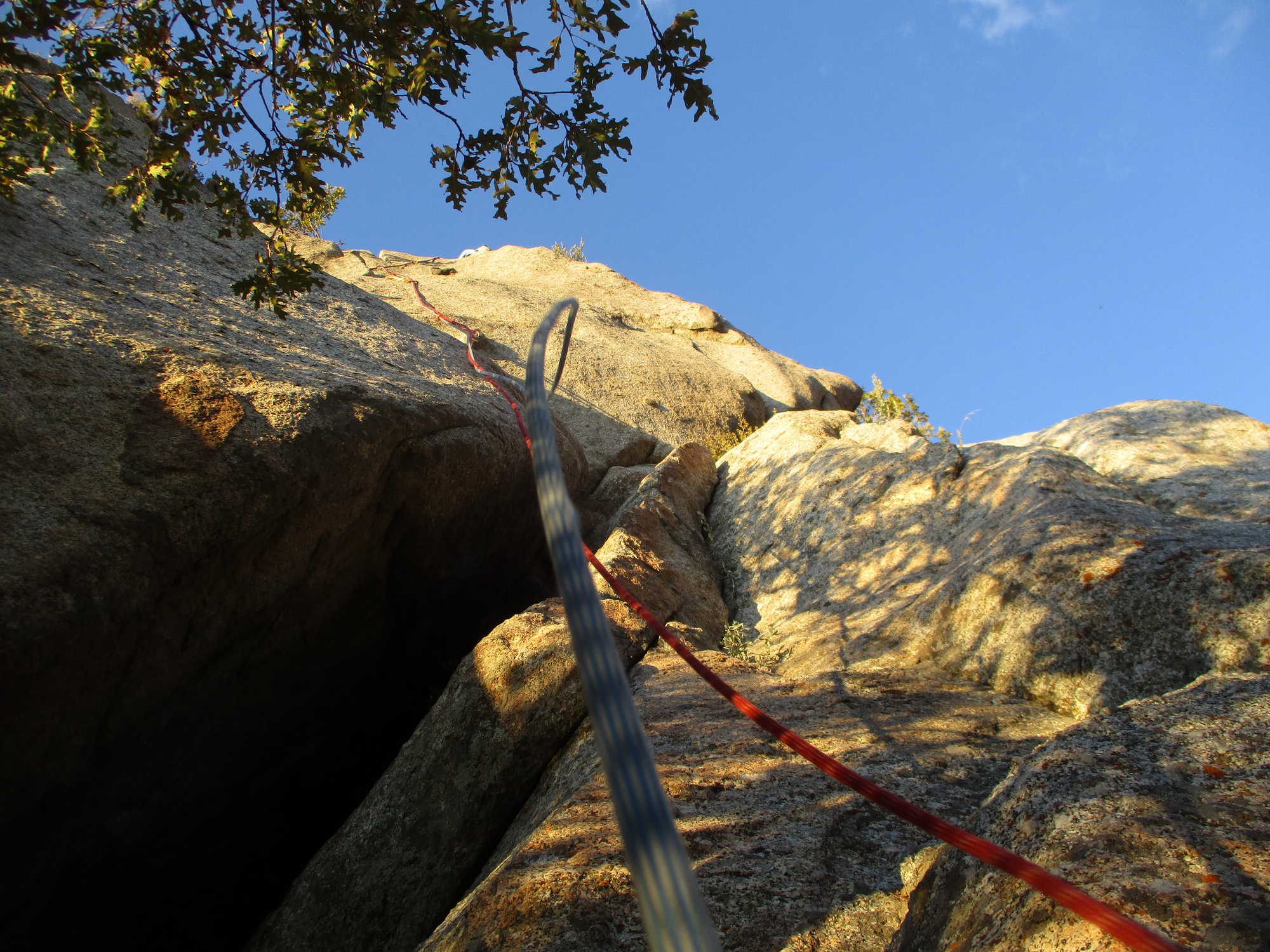 P2 seen from the P1 anchors. Climb the fun pillar, do an easy traverse ...