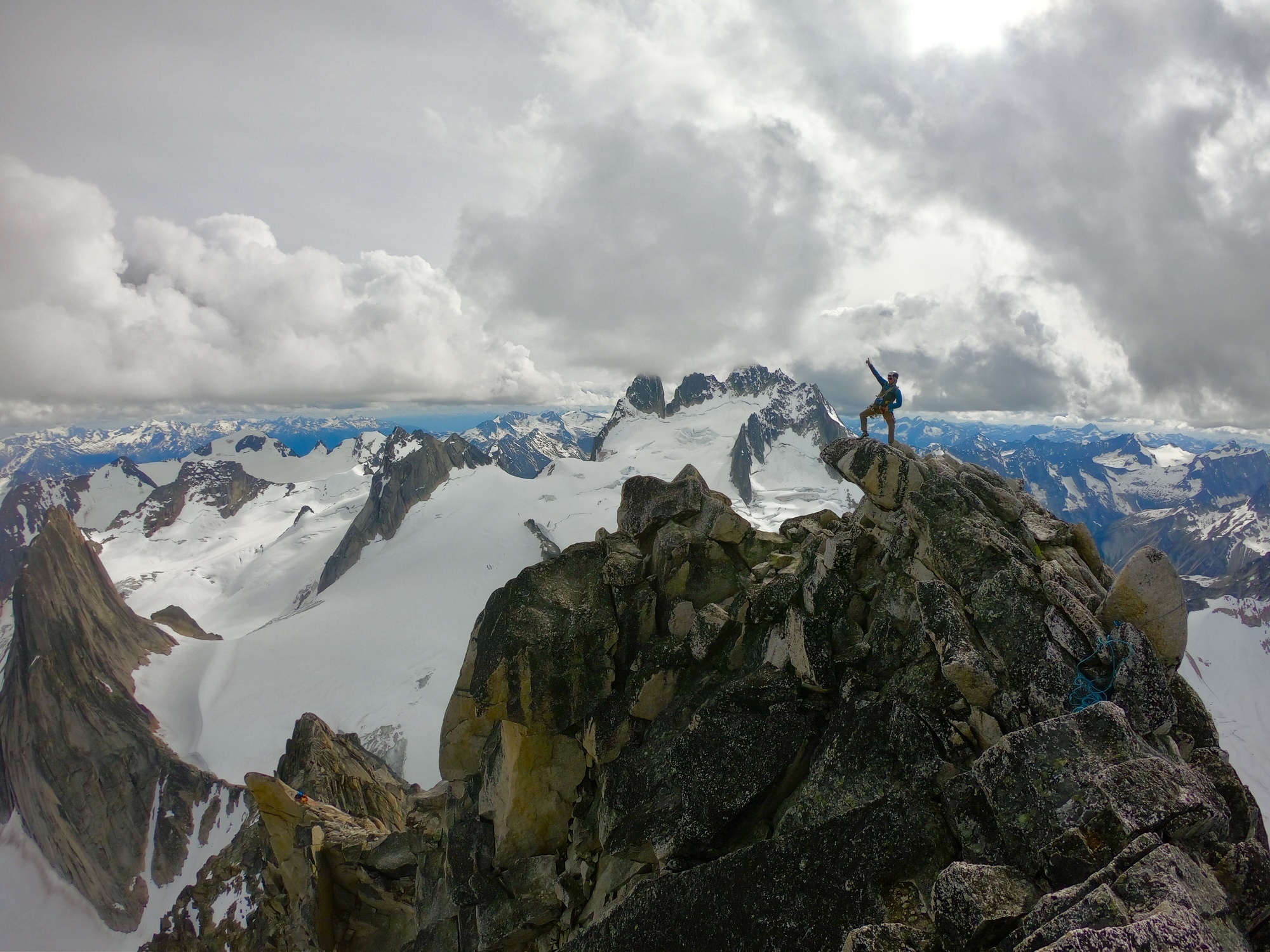 Summit with the Howser Towers in the distance