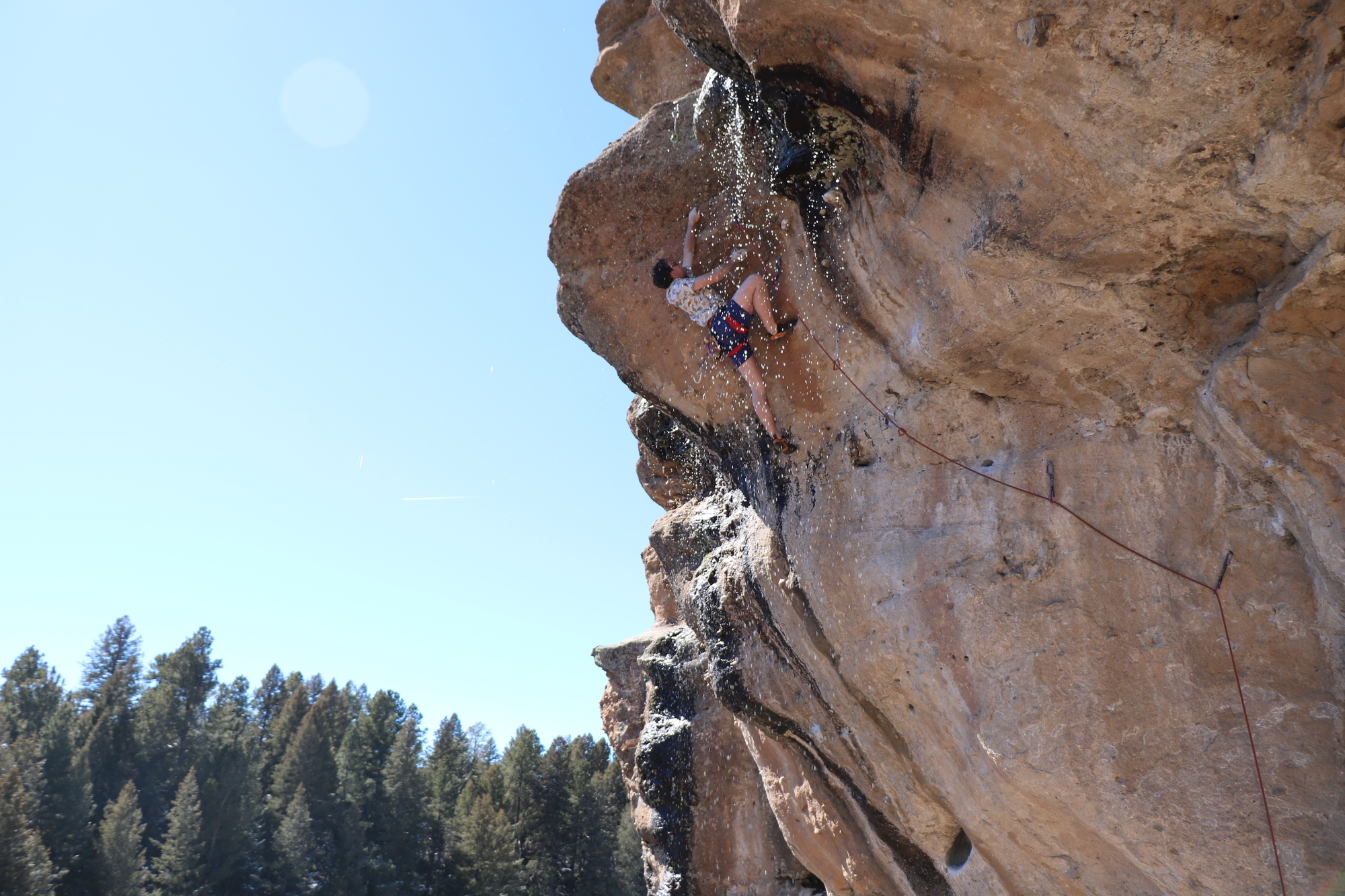 Traversing under the waterfall after a spring runoff. Naturally, only ...