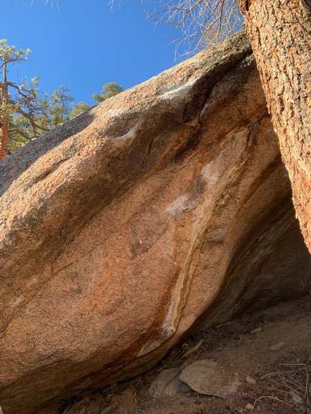 Climbing in The Tunnel Boulder, South Platte