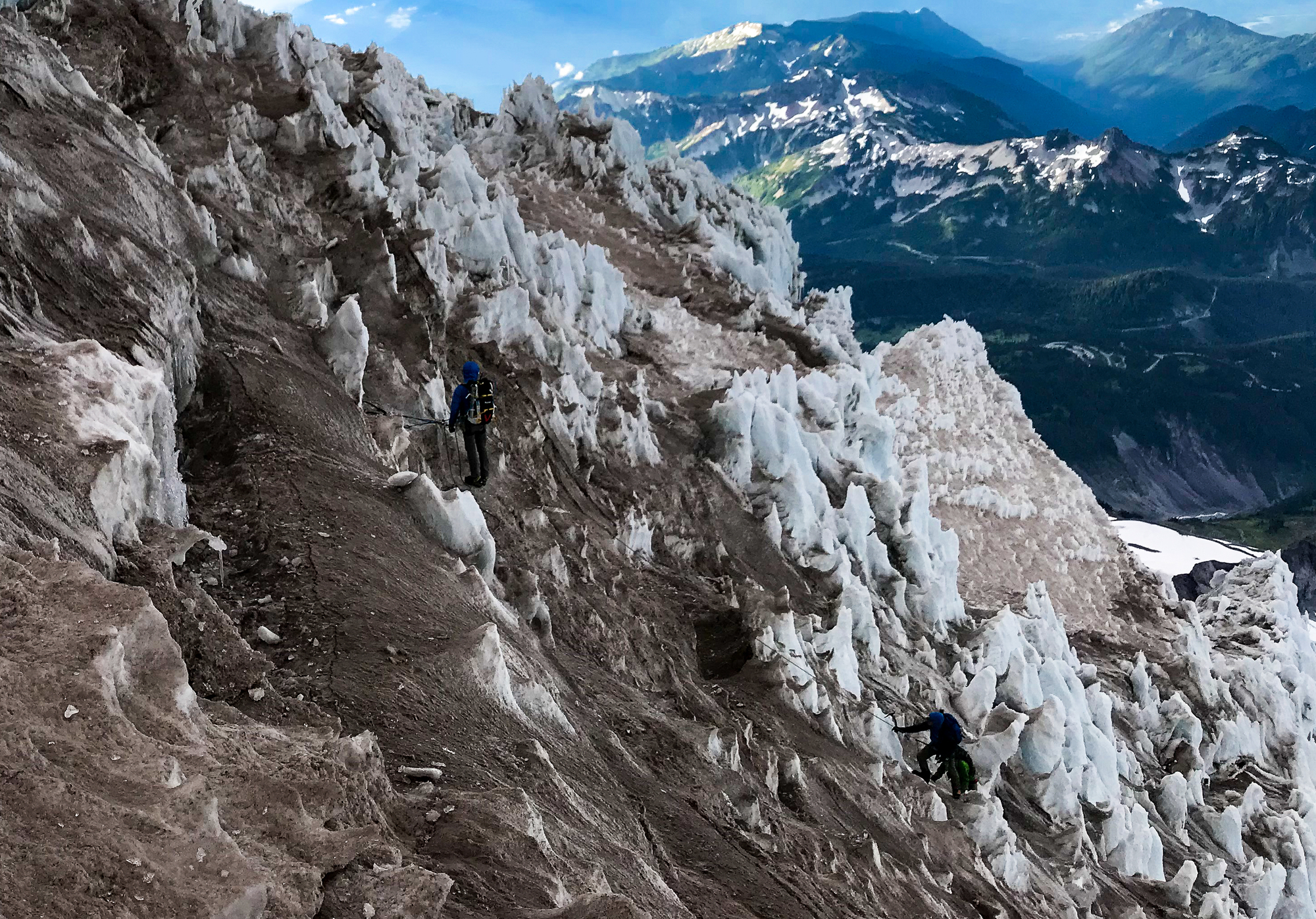Dallas Glass belaying from above in the Ice Chute