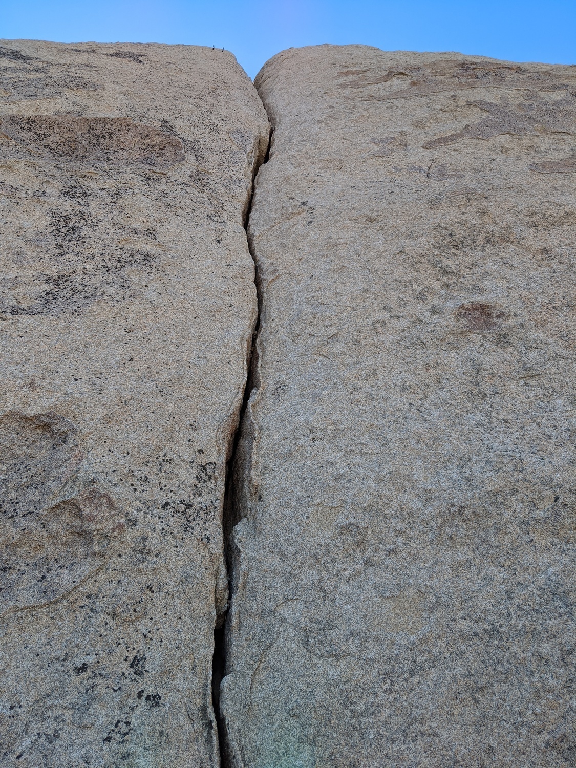 Crack shown from belay location on top of boulder. See cold shuts at ...