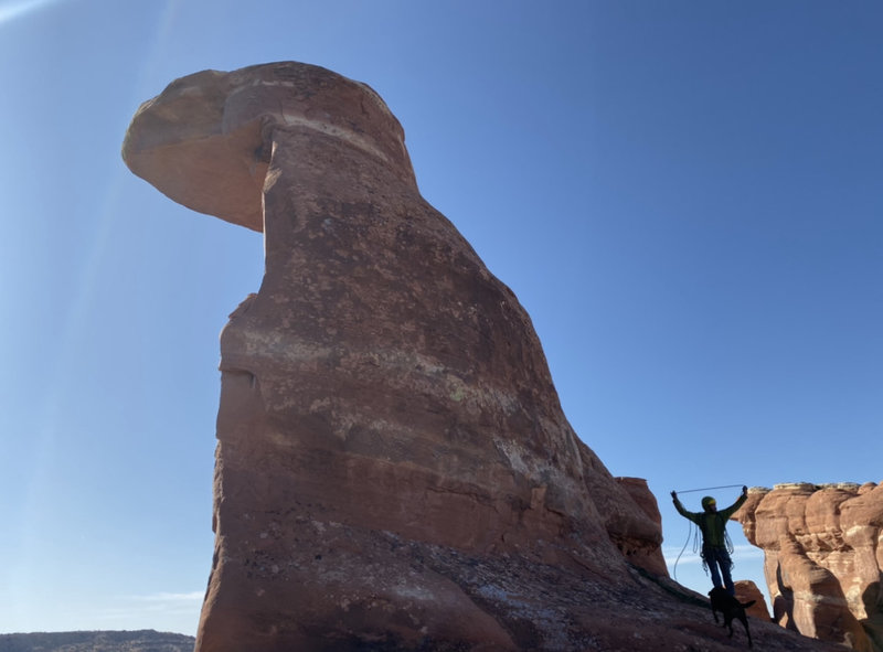 Justin flaking rope at base of tower