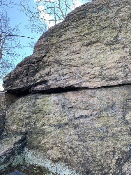 Climbing in Puddingstone Boulder, Eastern, MA