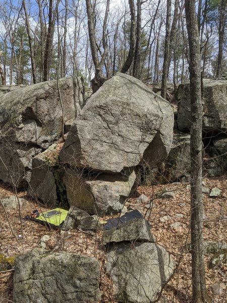 Climbing in Top Heavy Boulder, Eastern, MA