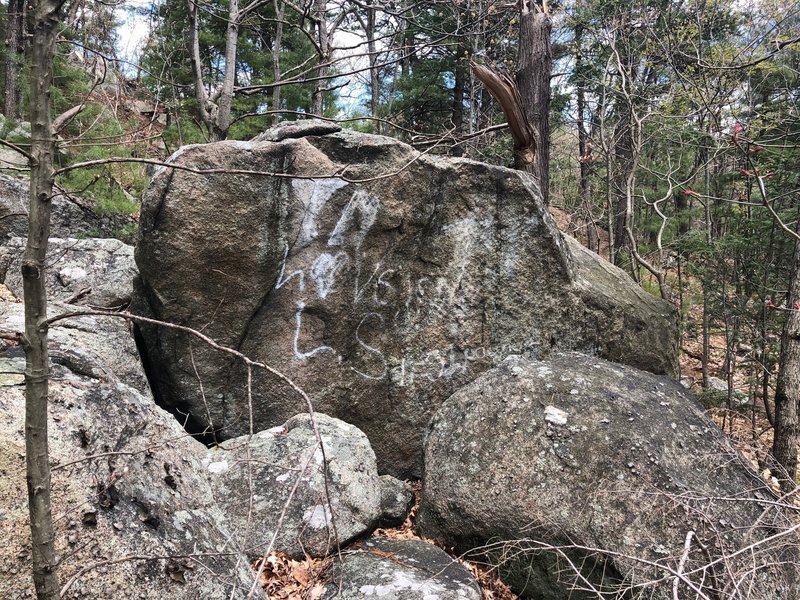 Climbing in Meteorite Boulder, North Shore