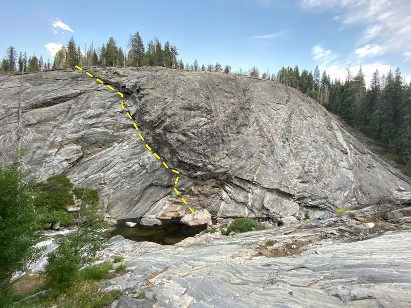 Follow the left facing dihedral to the top and walk off the slabs ...