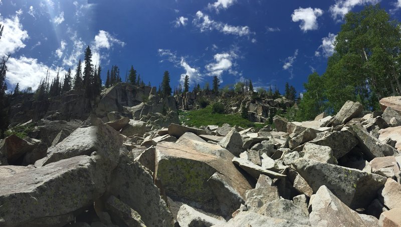 View of the crag from near the bottom of the scree field. Most of the ...