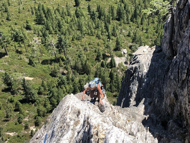 Climber gaining the ridge proper to the true summit. This is where the ...