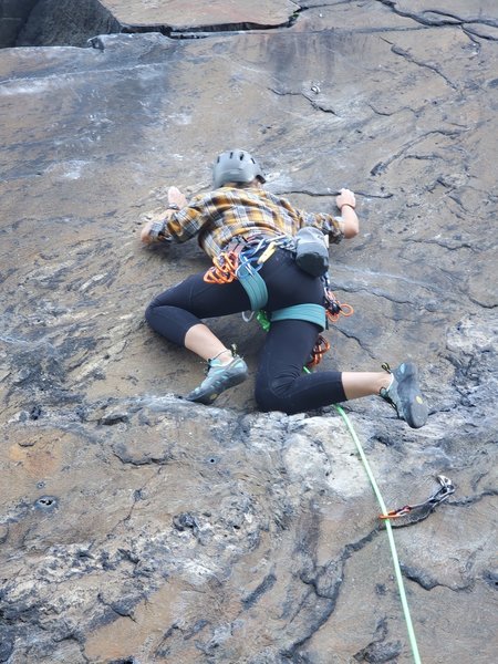 Reaching for finger pockets after pulling the double mantle move onto ...