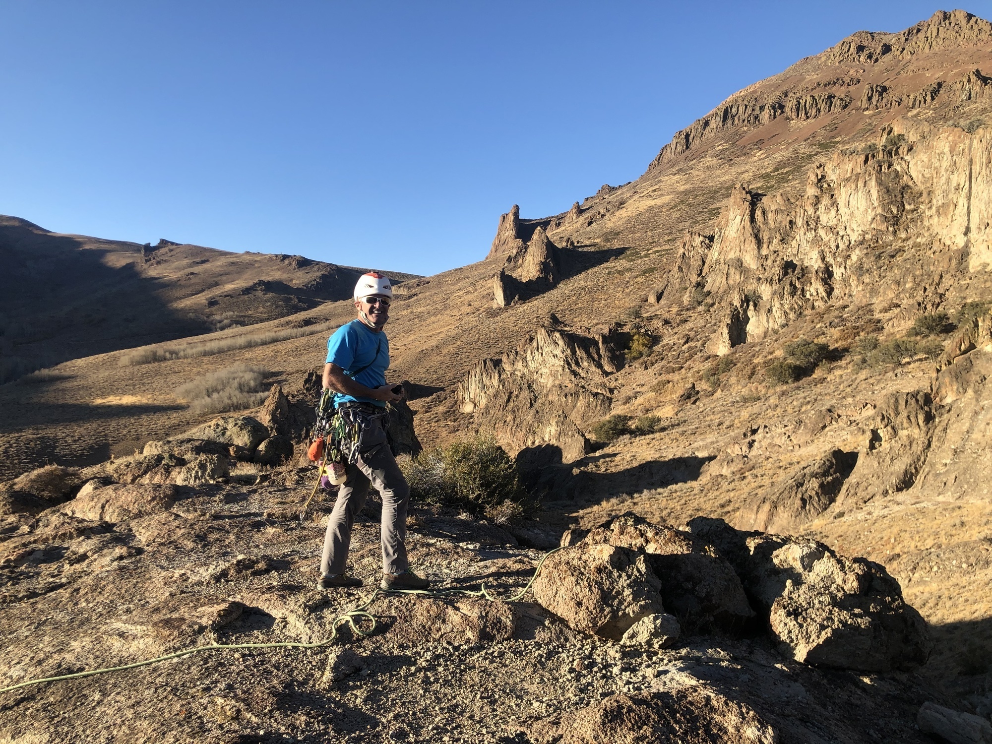 John on top of the Cleft enjoying the views. The pointy formation at ...