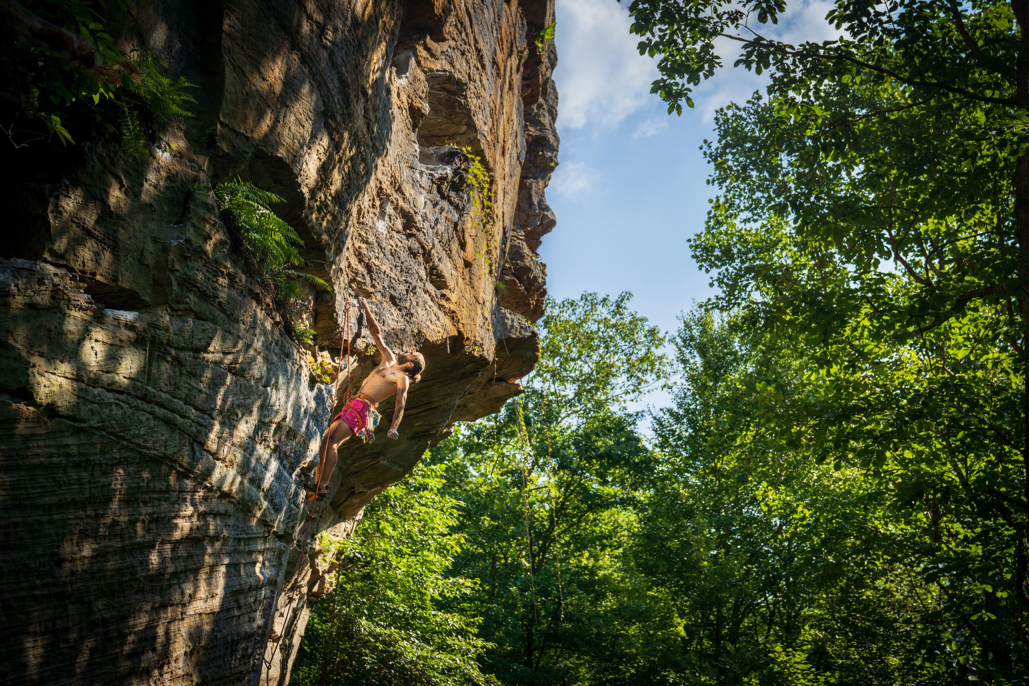 Christiaan basking in the sun on a send burn up Banshee.