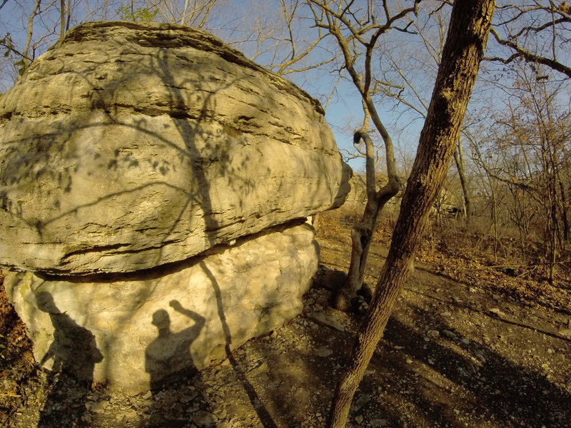 Climbing in The Bulge Boulder, WM: Swope & Blue River Limestone