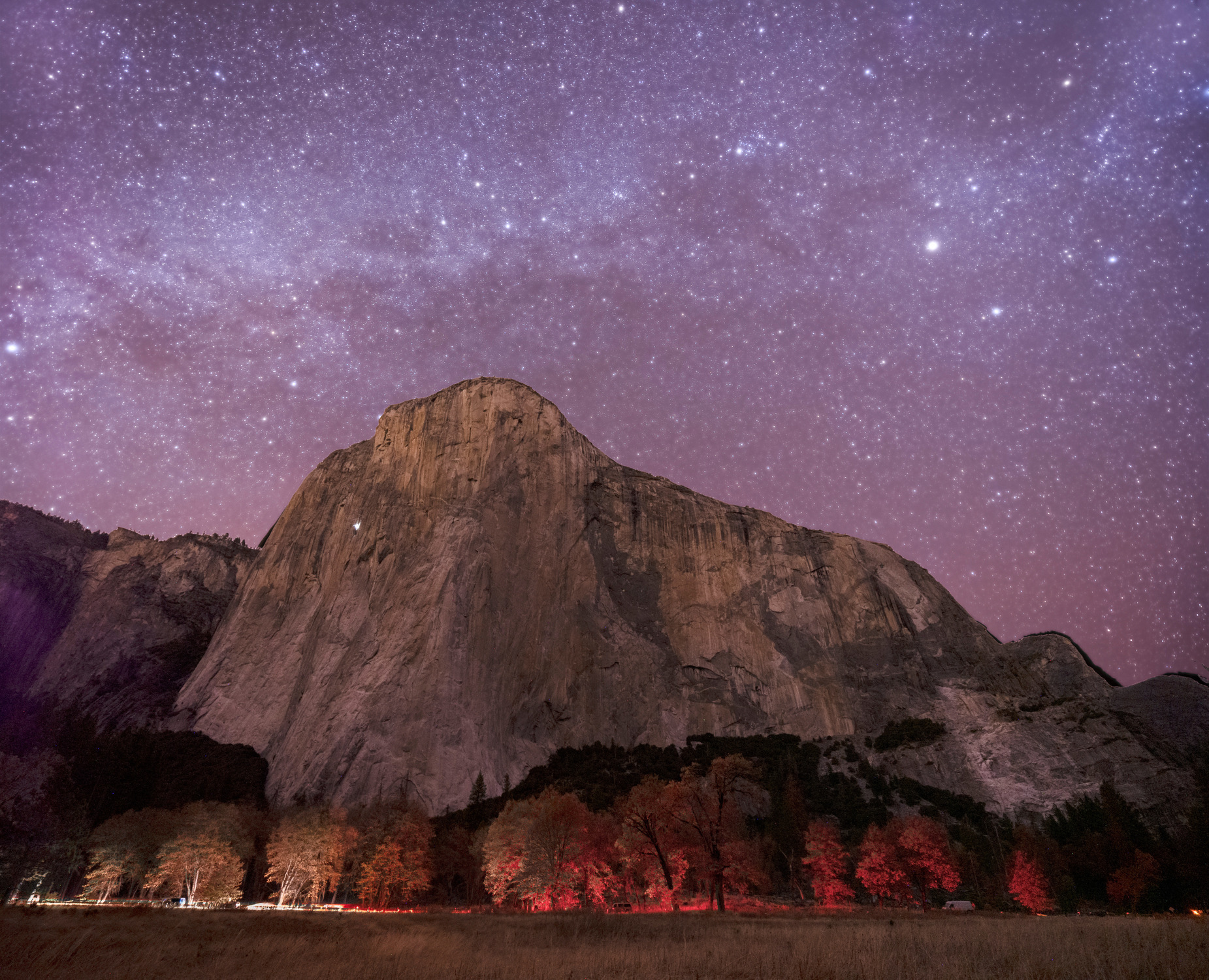 Climbers high on the Salathe Wall under the Milky Way on a cold ...