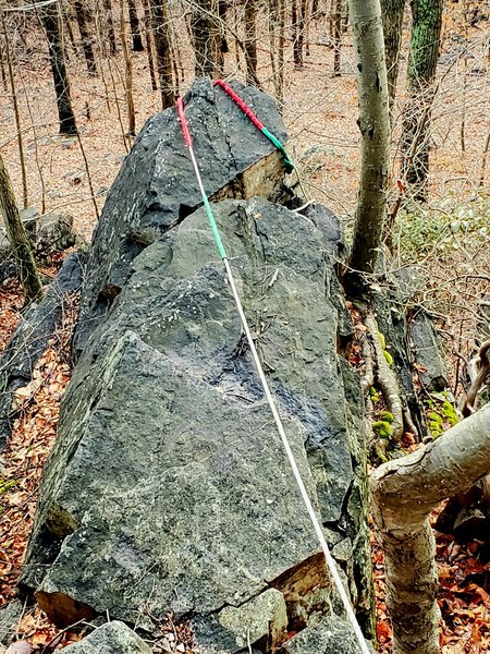A top rope setup on The Little Wall. Pad for sharp edges.