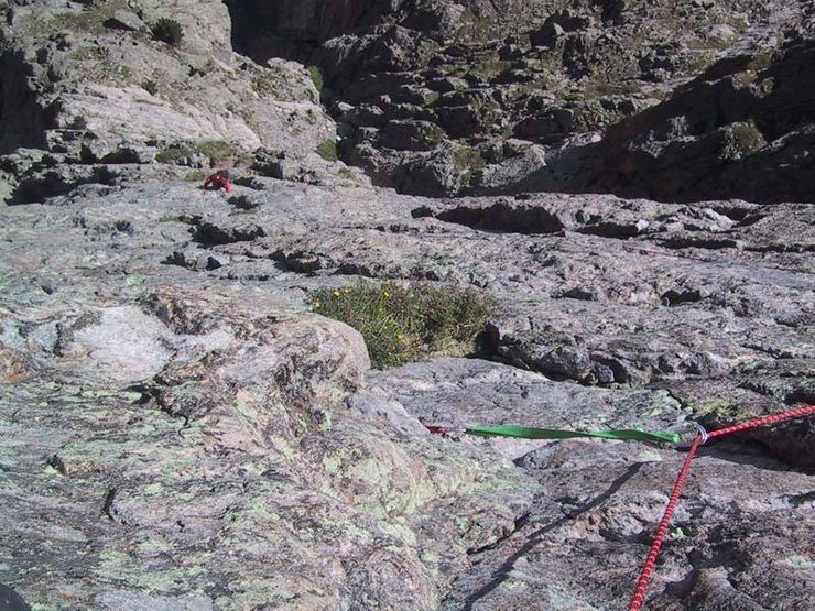 Looking down pitch 6 (in description). The grassy ledge below is a good ...