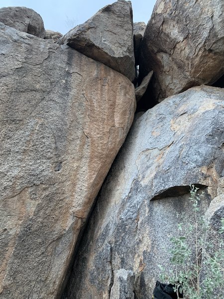 Finish above the higher chockstone. You could escape below it but would ...