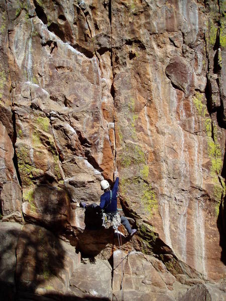Hanging from an amazing little chockstone above the first overhang. The ...