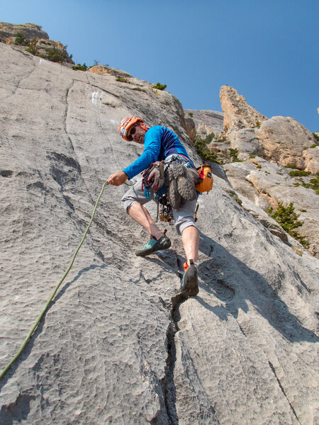 Sam Lightner high on Colter's Rib. Colter's Spire looming above. Taken ...