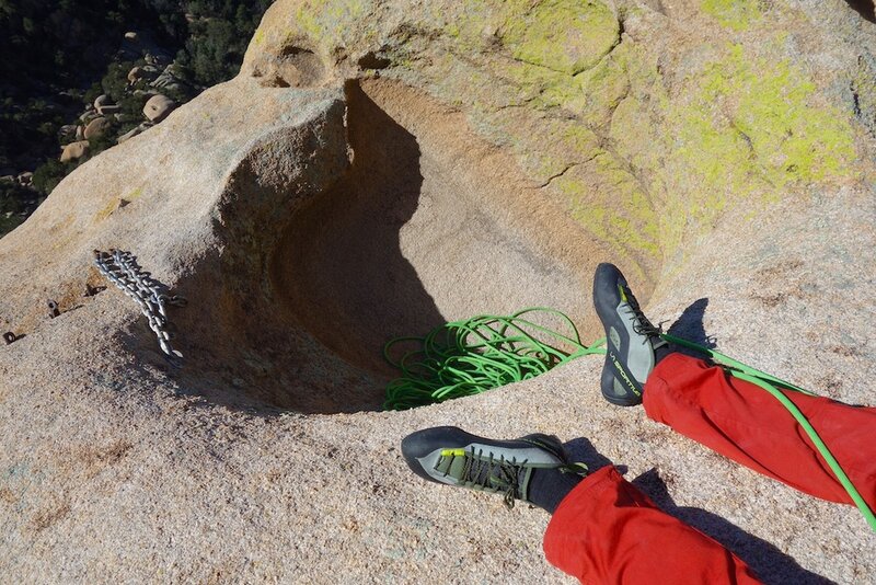 The summit rappel anchor, wind-formed tub, and TC pros.