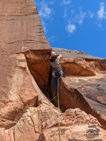 Me getting into the crux. Small person beta includes hand-fist stack ...
