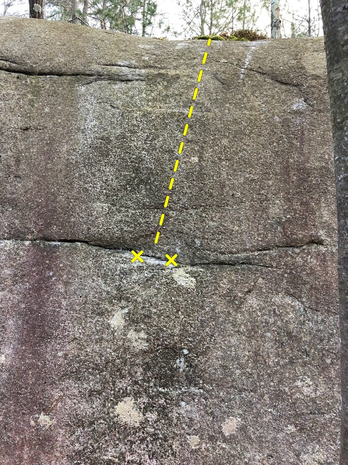 Sit start on the marked holds. The mini-pinch is chalked up on the right.
