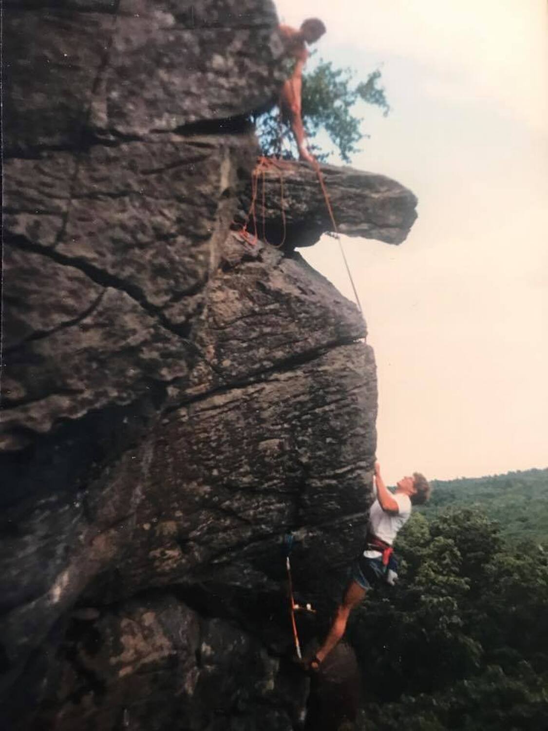 Clay Erickson working the crux on The Wizard, Joseph Healy belaying.