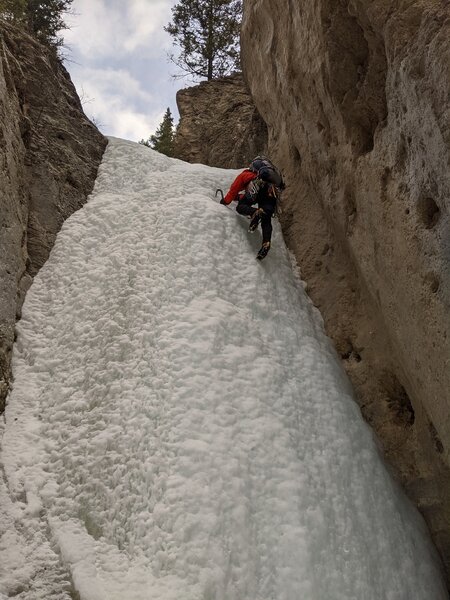 Soloing up the first step of ice.