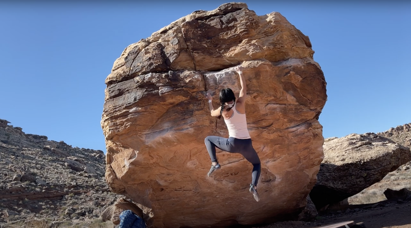 Jumping and catching the jug-ish hold at the rightmost part of the rail