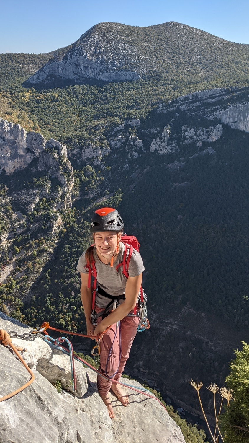 Kira Engle at the anchors for the start of the 3 rappels for Rivière d ...