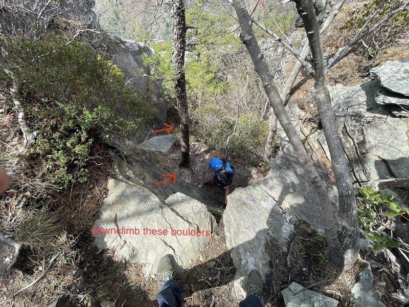 Downclimb these 2 boulders (V0—, V-ladder) to continue on to the rappel ...